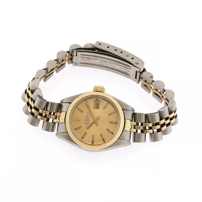 Rolex: A lady's wristwatch of 18k gold and steel. Model Datejust, ref ...