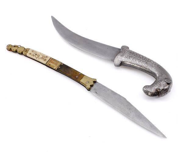 A recent Indian silver decorated dagger and an antique French folding ...