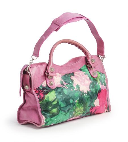 Balenciaga: A "City" bag of pink leather and pink and green nylon with ...