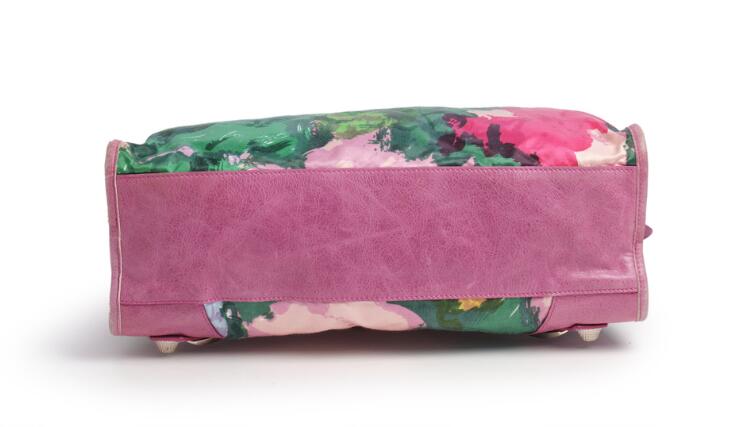 Balenciaga: A "City" bag of pink leather and pink and green nylon with ...