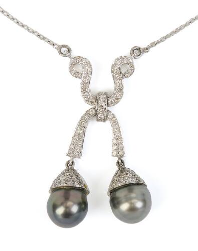 A pearl- and diamond necklace set with Tahiti cultured pearls and ...