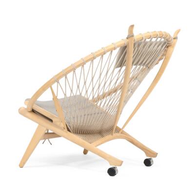 Hans J. Wegner: “The Circle Chair”. Lounge chair with ash frame. Seat ...